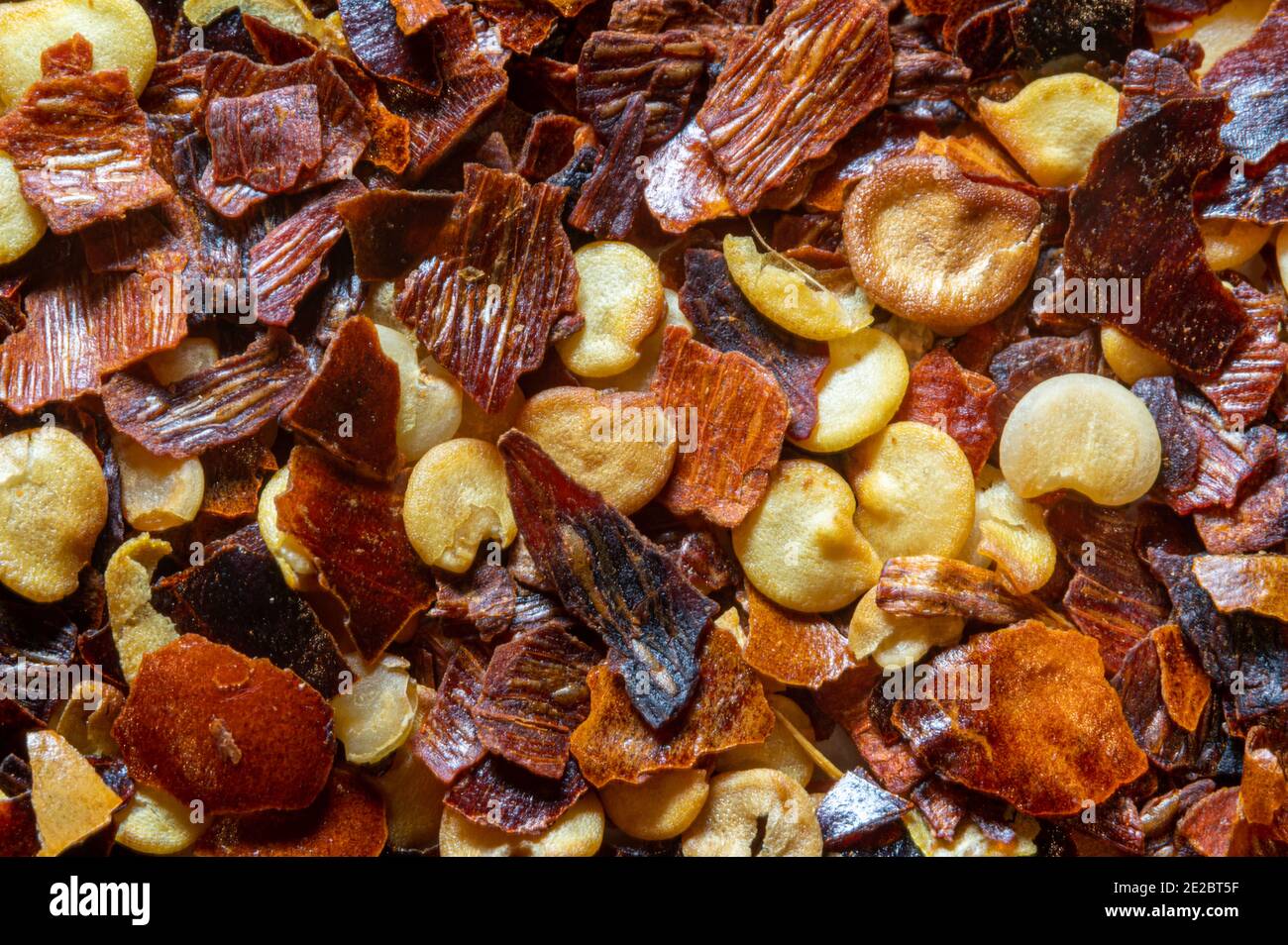 Sprinkles of dried chili flakes Stock Photo - Alamy