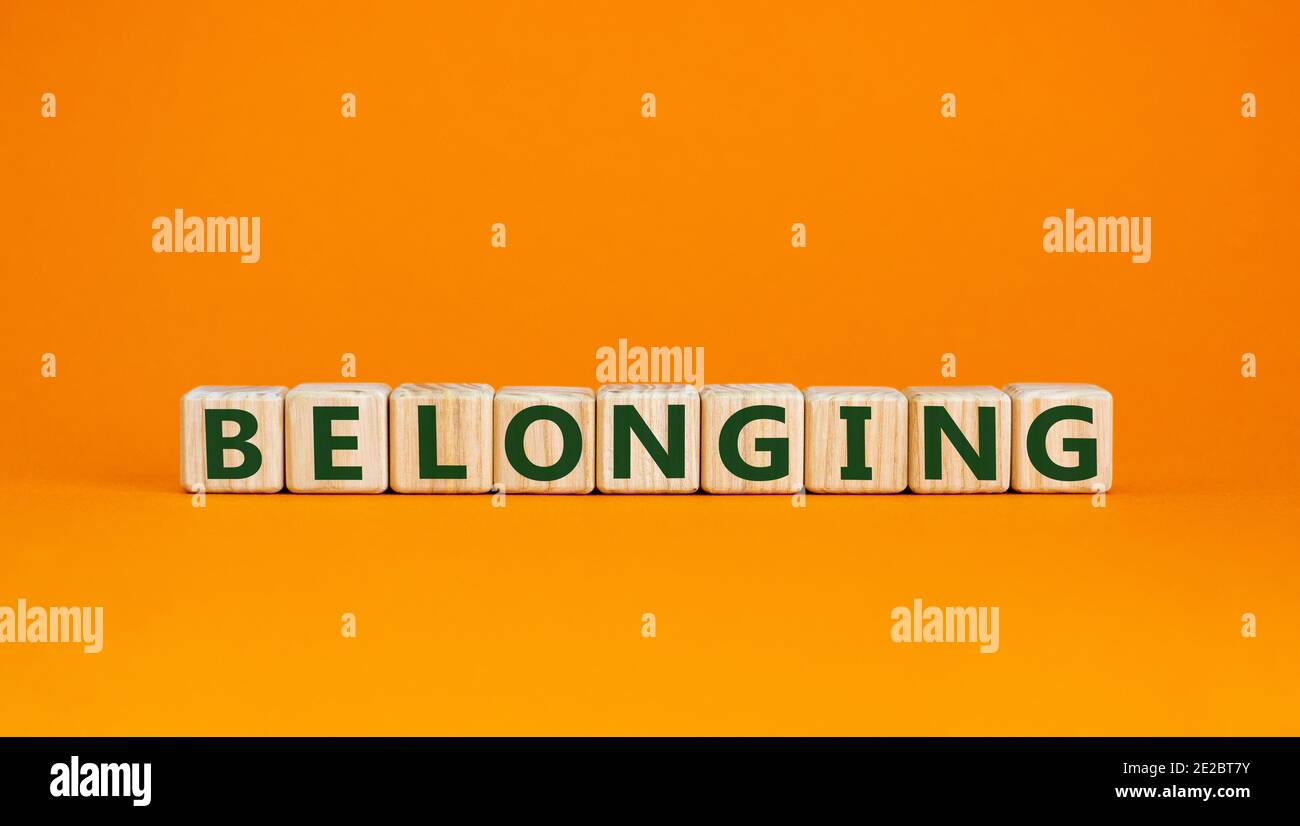 Belonging and better inclusion symbol. Belonging word on wooden cubes ...