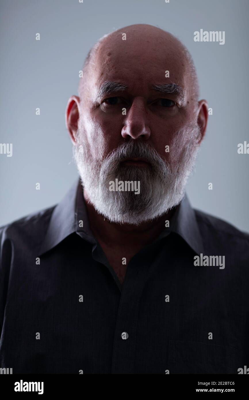 Portrait of a man in his 70s Stock Photo - Alamy