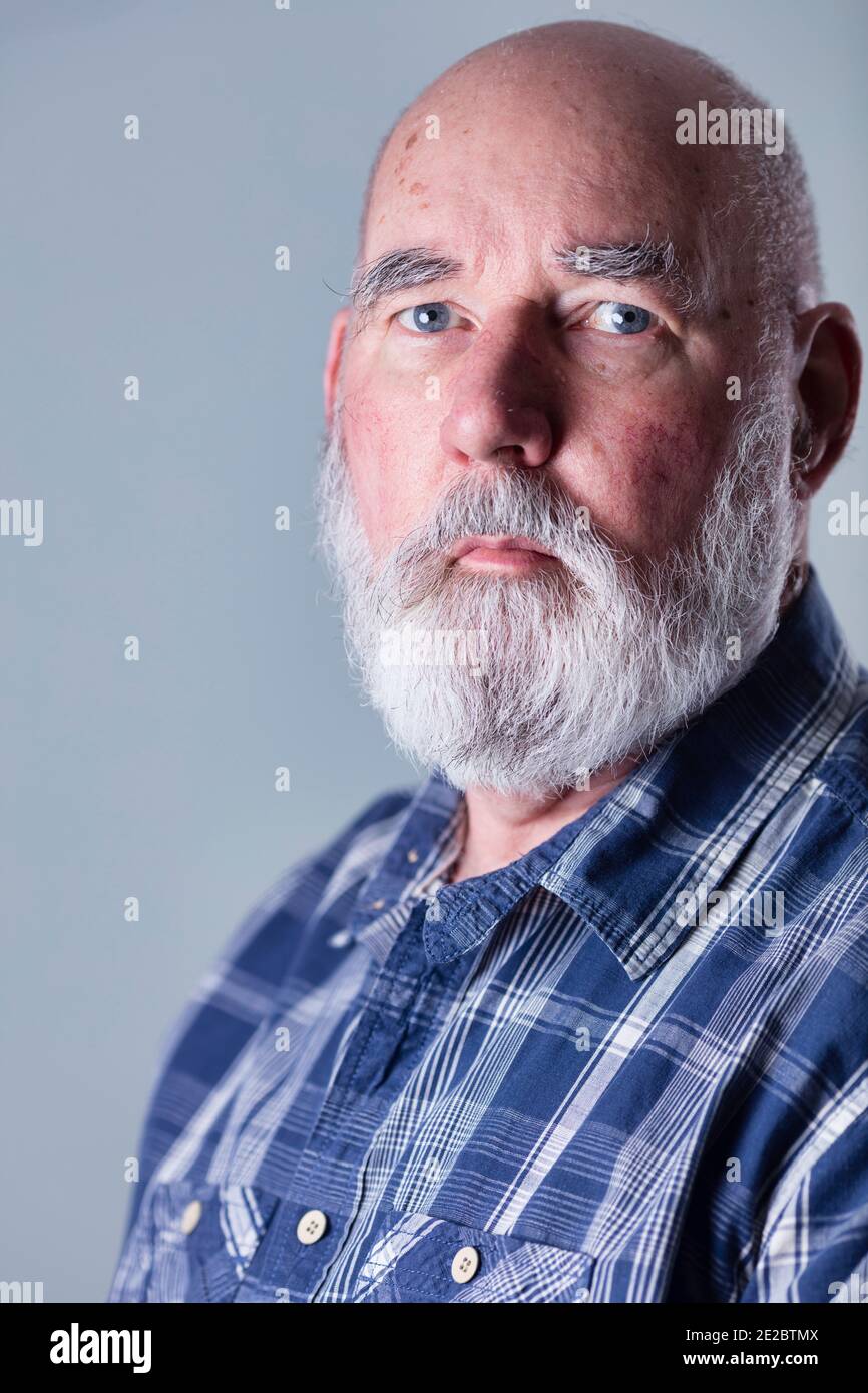 Portrait of a man in his 70s Stock Photo - Alamy