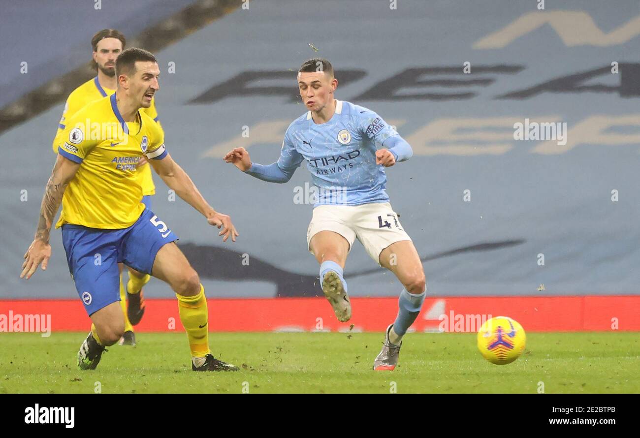 Manchester City's Phil Foden scores his side's first goal of the game ...