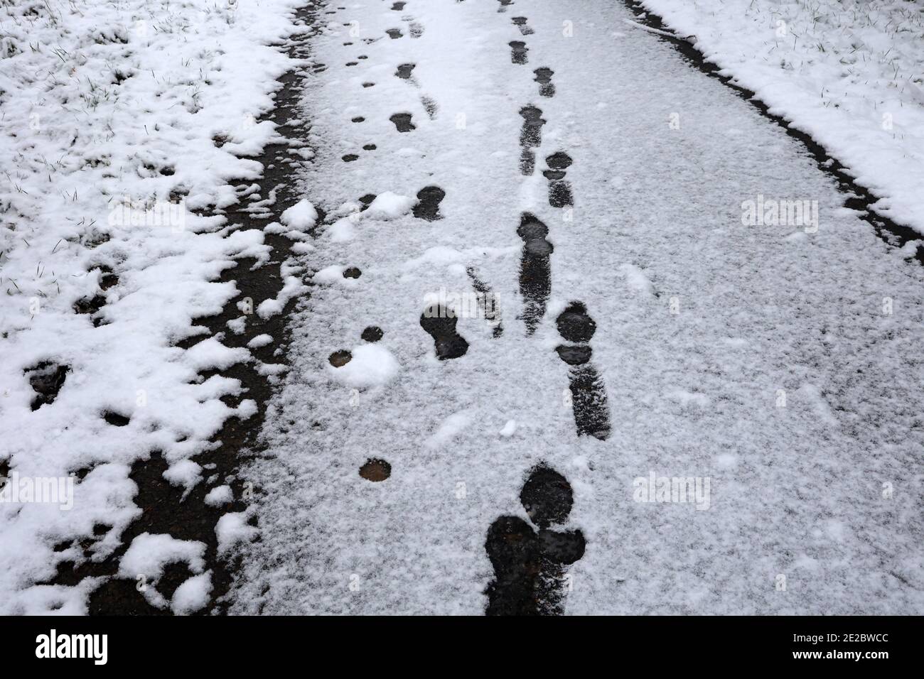 White footprints on asphalt hi-res stock photography and images - Alamy