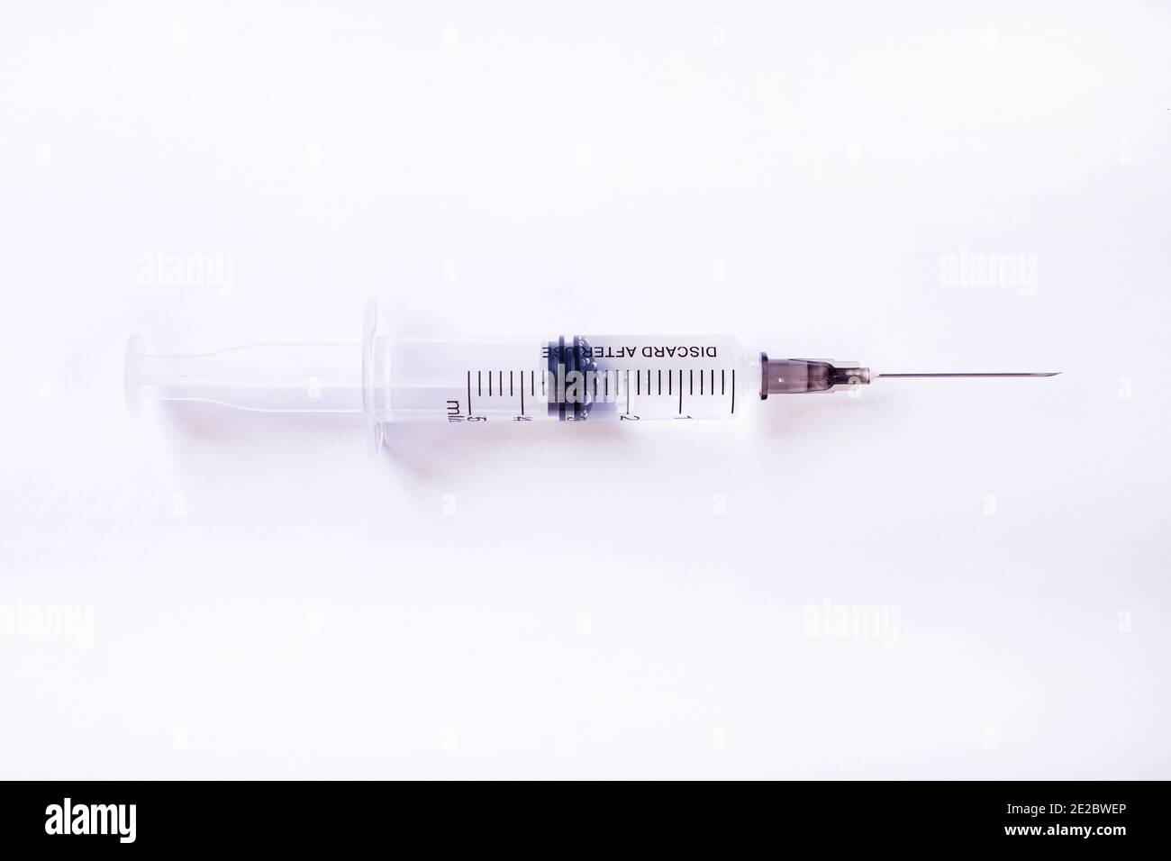Syringe close up on a white background, medicine Stock Photo - Alamy