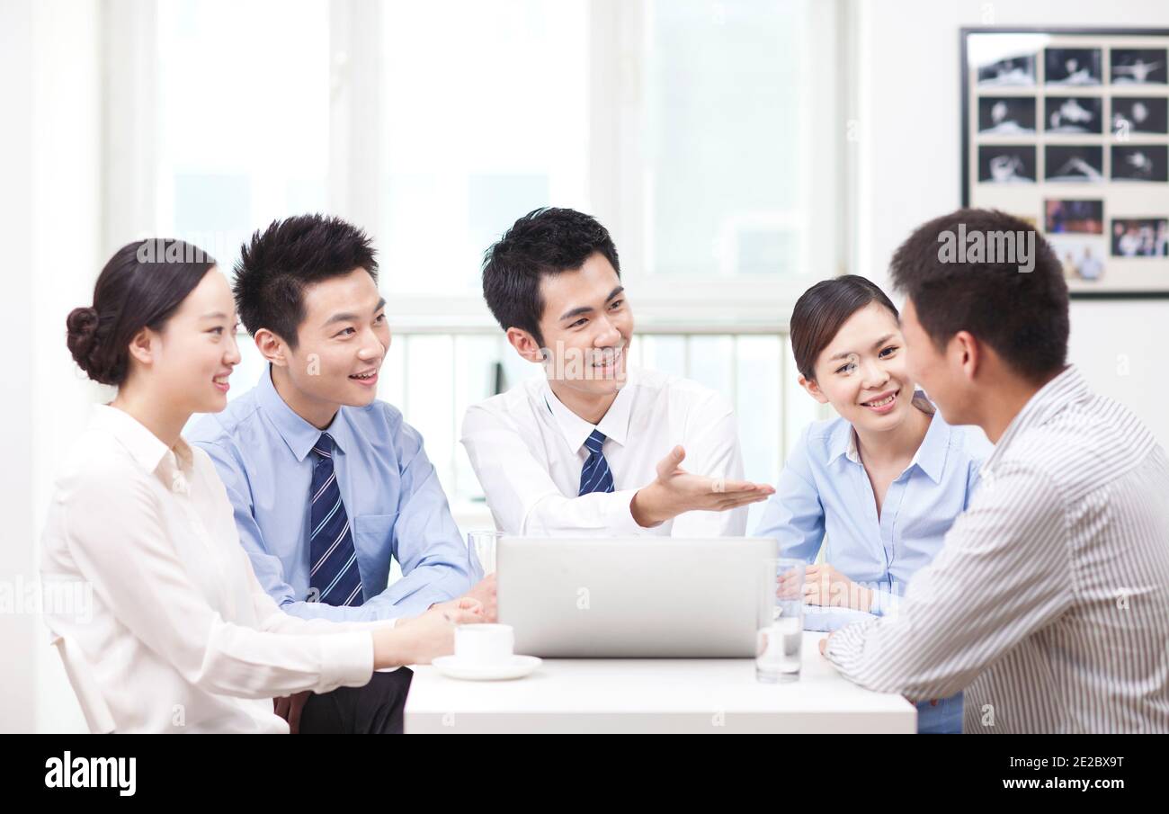 Group of businesspeople discussing working on computer high quality ...