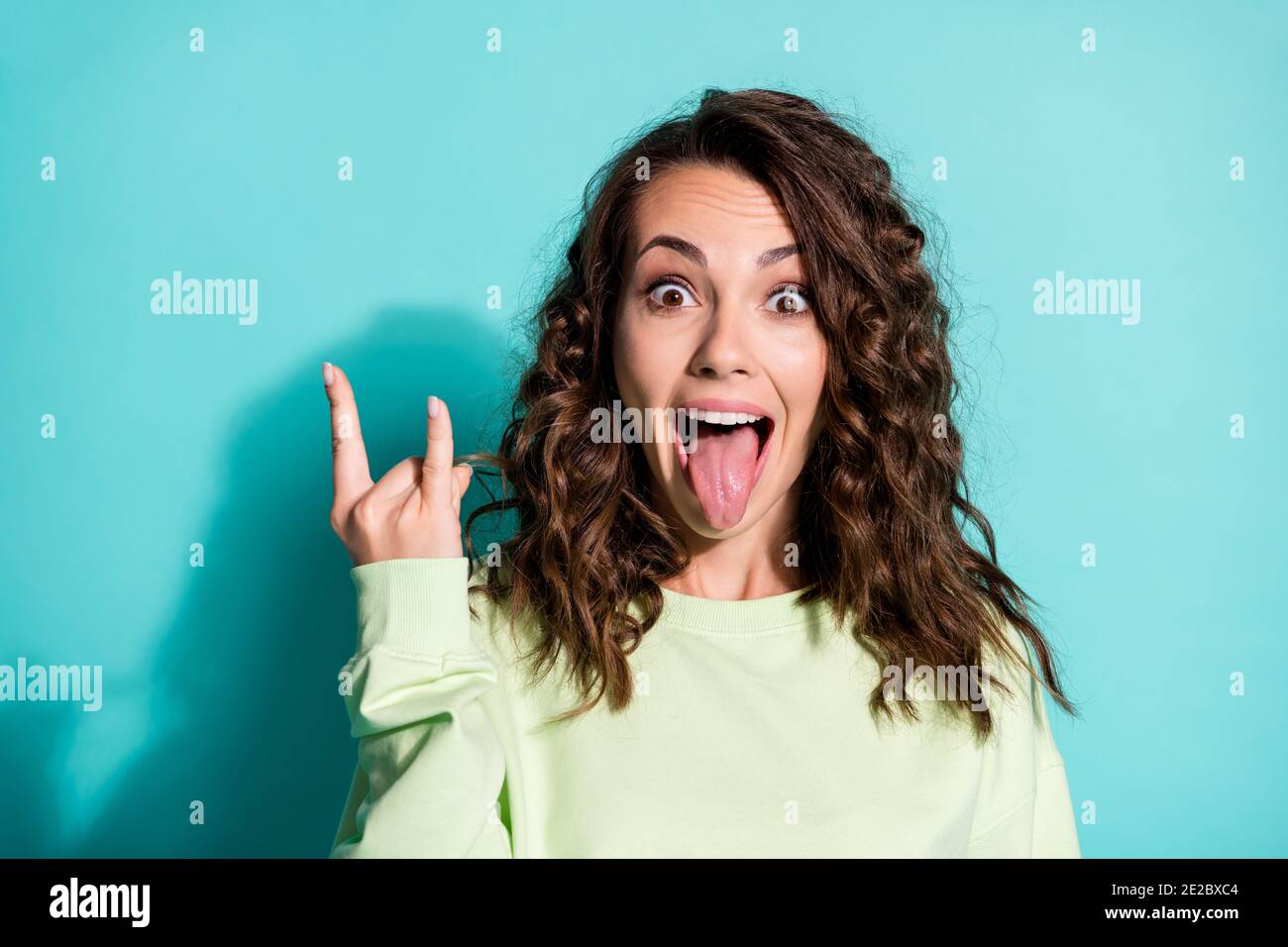 Tongue sign horns hi-res stock photography and images - Alamy