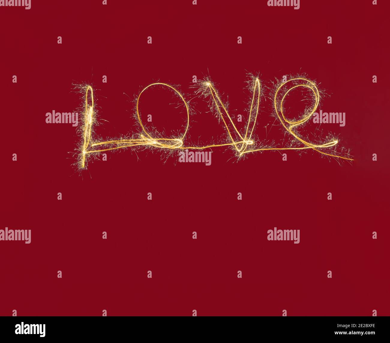 freezelight. drawing with light using sparklers. Love lettering. Long ...