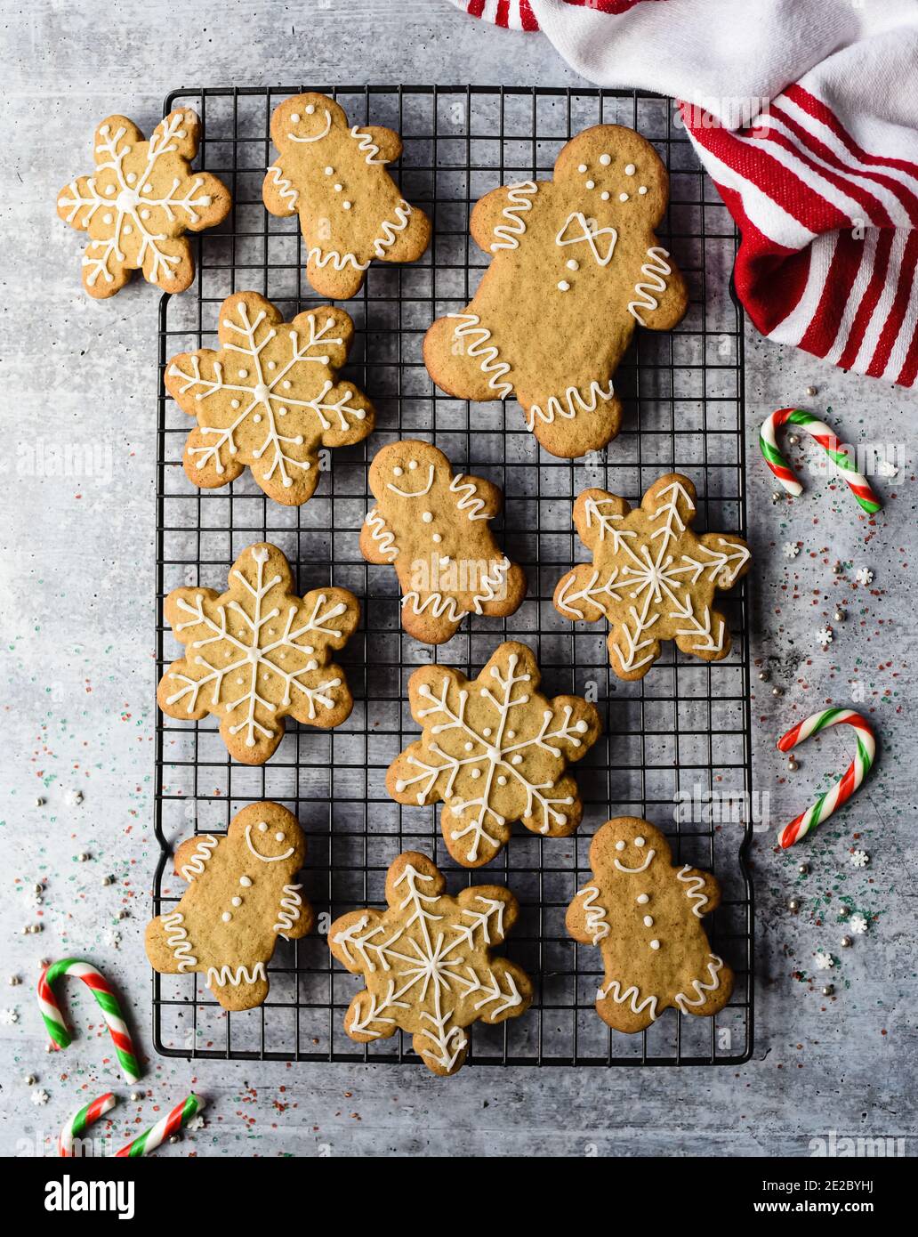 Overhead of gingerbread cookies on wire rack on grey stone counter ...