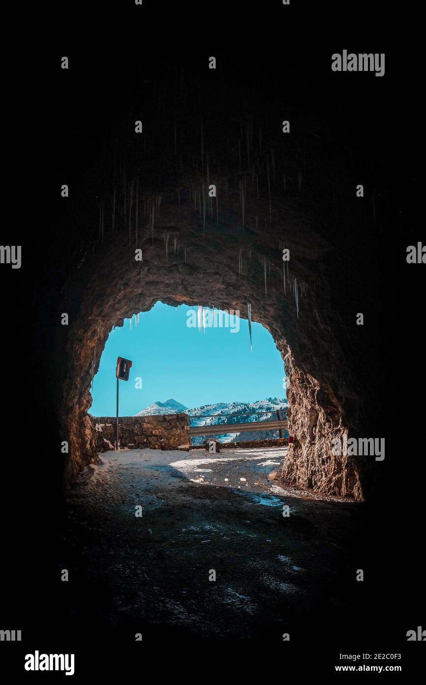 Closeup shot of a stone cave entrance inside Stock Photo - Alamy