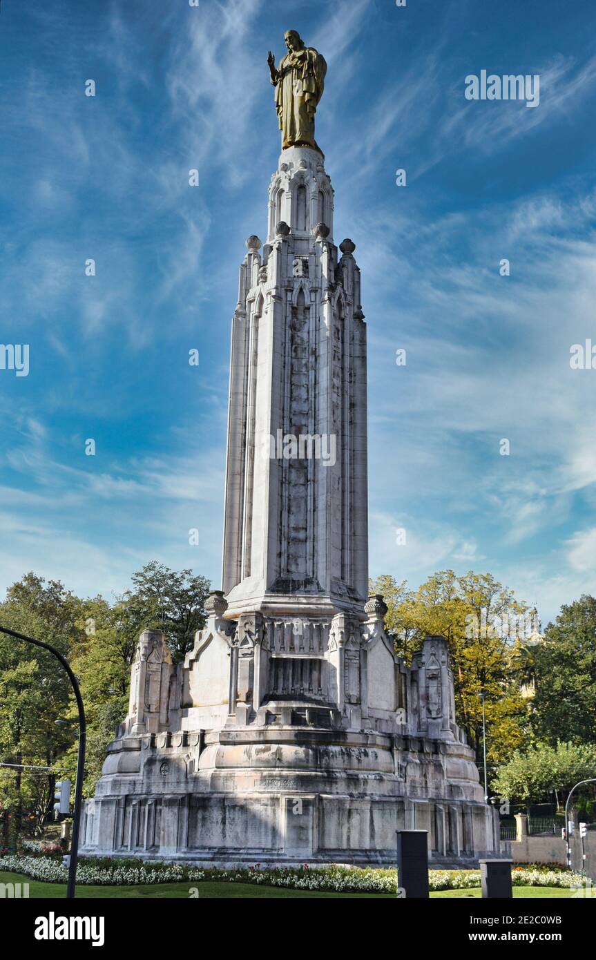 Vertical shot of the monument to the sacred heart of Jesus in the city ...