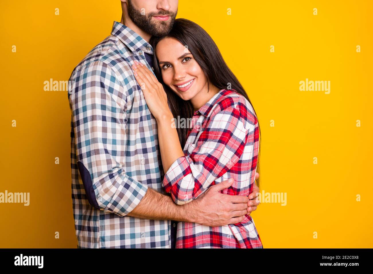 Photo portrait of girl laying on man's chest hugging isolated on vivid ...
