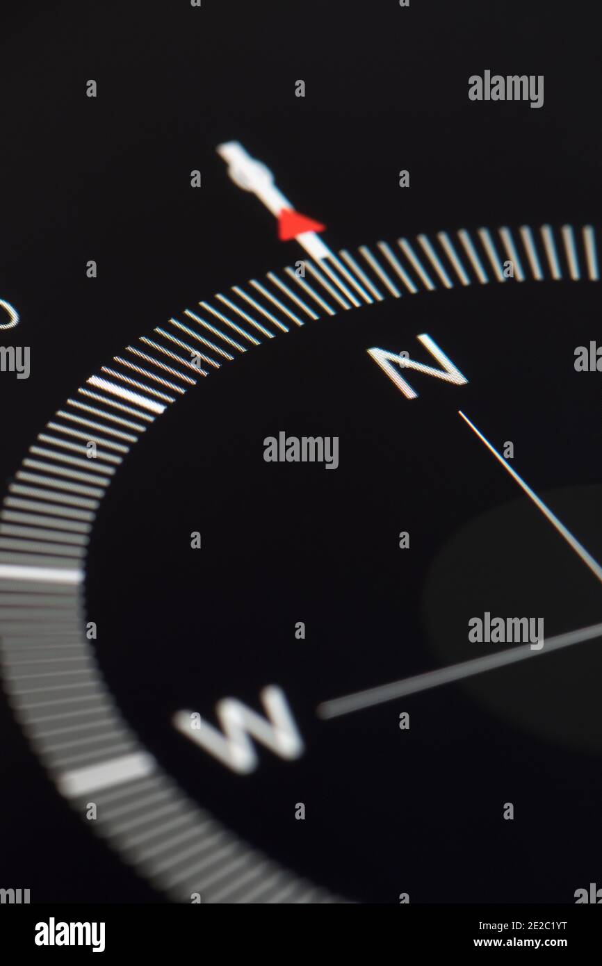 Close up detail of a digital compass pointing North on an APP on the ...