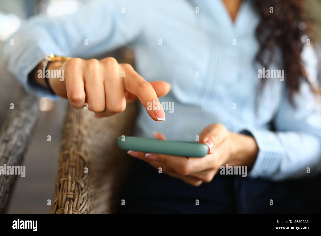 Lady holding mobile Stock Photo - Alamy