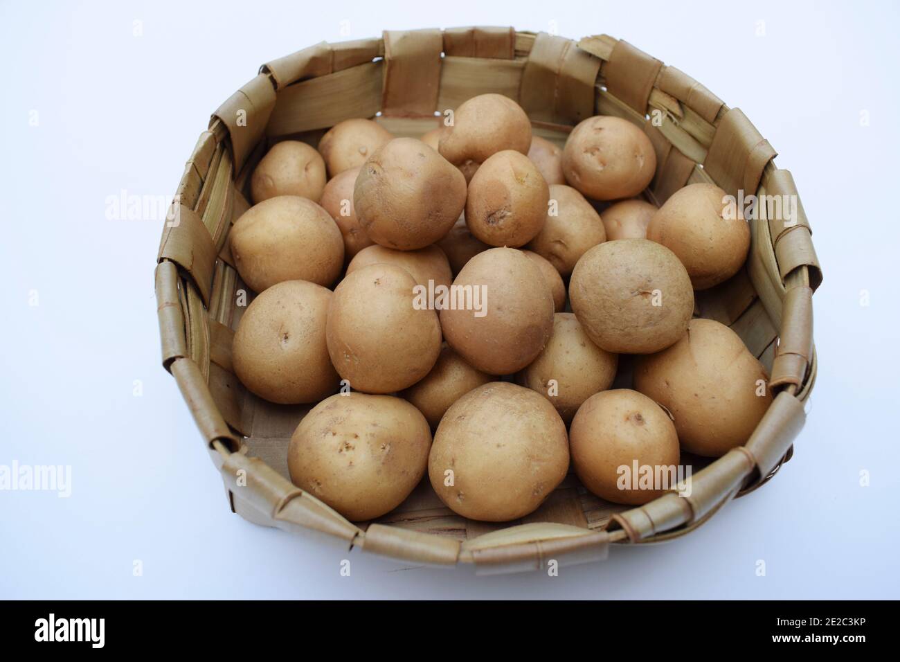 Baby potatoes small round potato from india on white background Asian ...