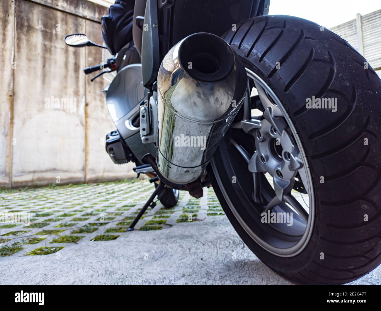 Detail of the left side exhaust of a motorbike Stock Photo - Alamy