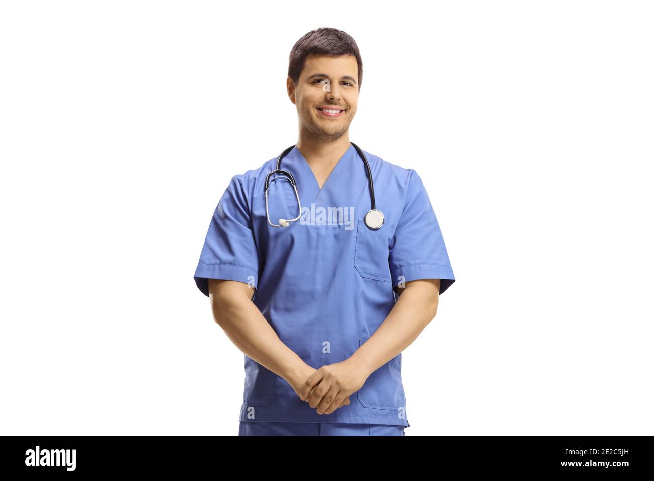 Intern in a blue uniform posing and smiling isolated on white ...