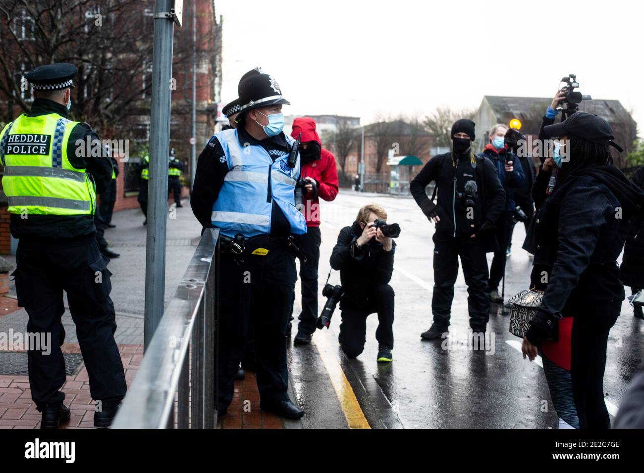 Protesters gather outside Cardiff Bay Police Station in solidarity to ...