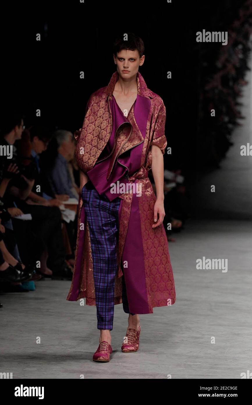 A model displays a creation by designer Haider Ackermann for his Spring ...