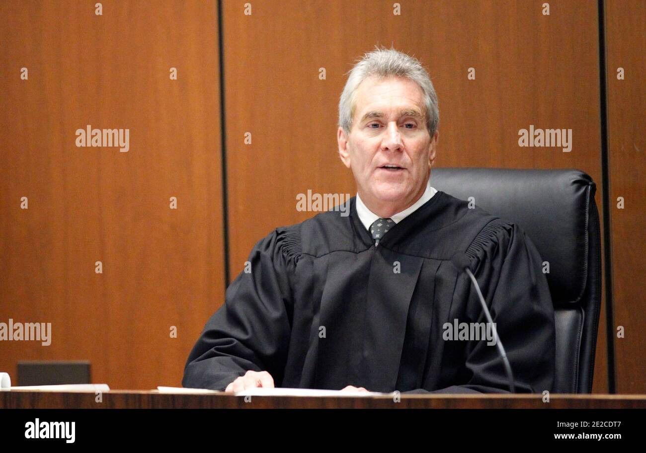 Judge Michael E. Pastor addresses the courtroom during Dr. Conrad ...