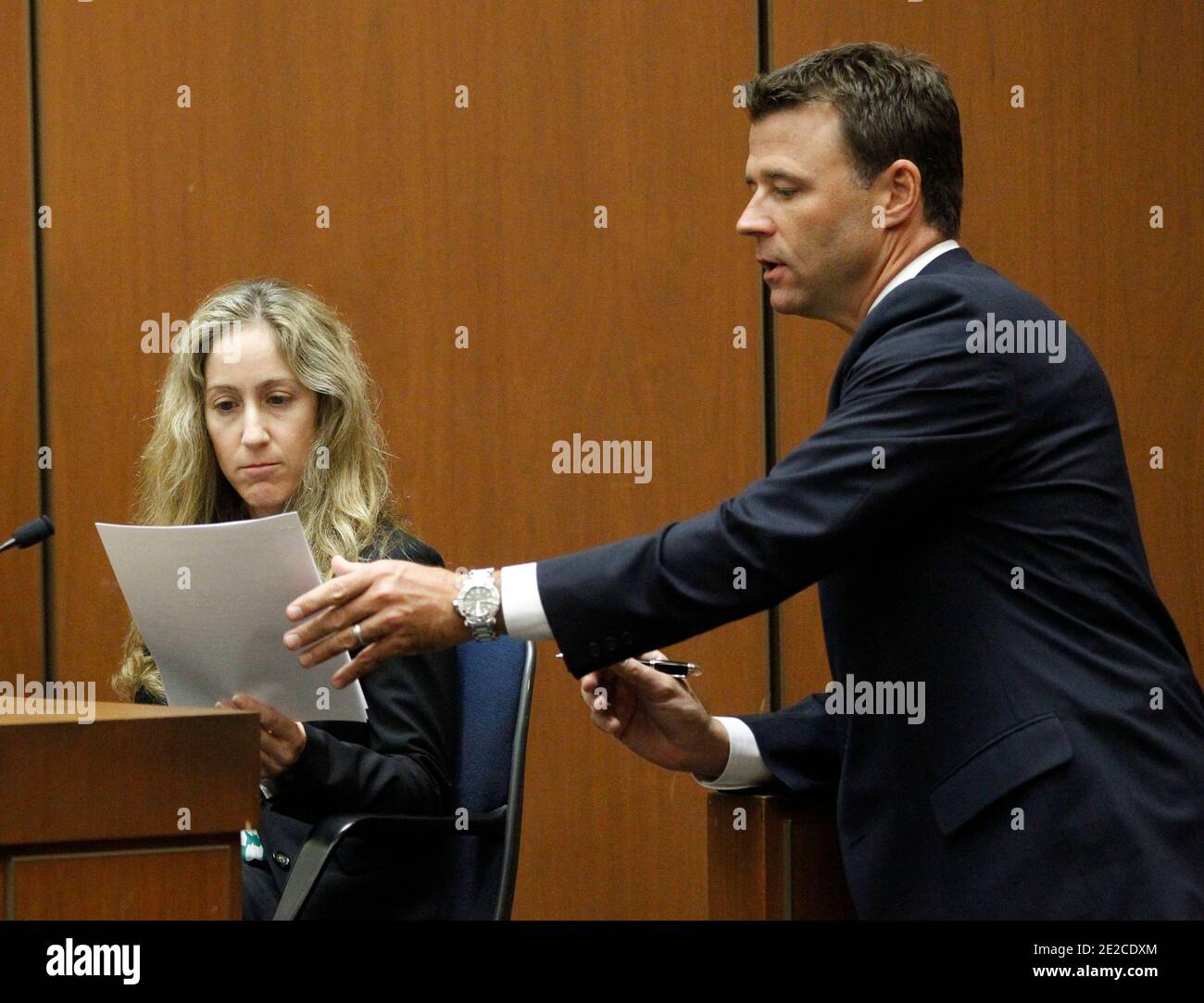 Deputy District Attorney David Walgren questions Dr. Richelle Cooper ...