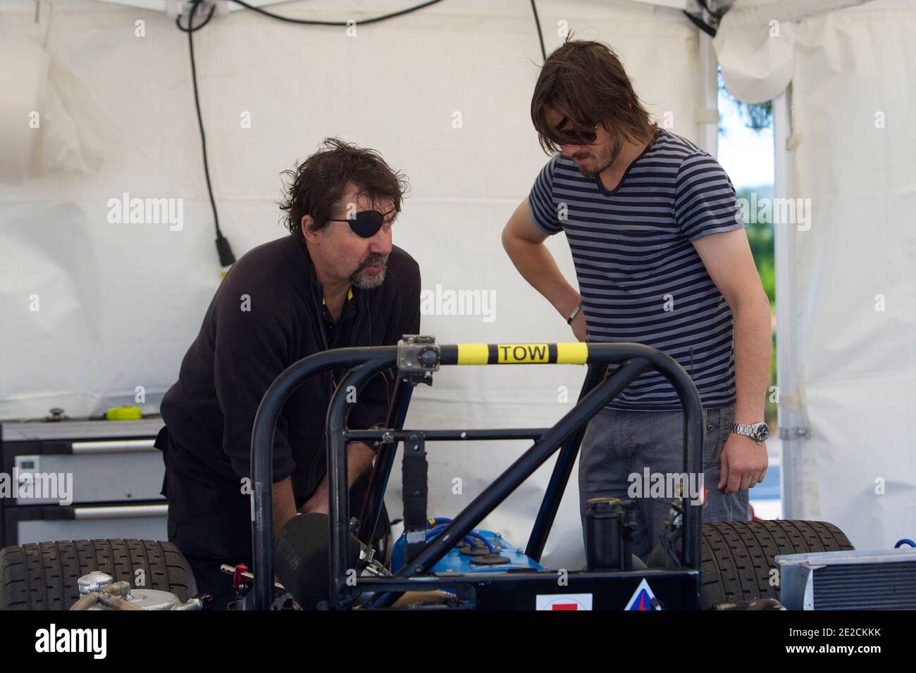Scottish drummer Neil Primrose of Travis band, takes part in a motor ...