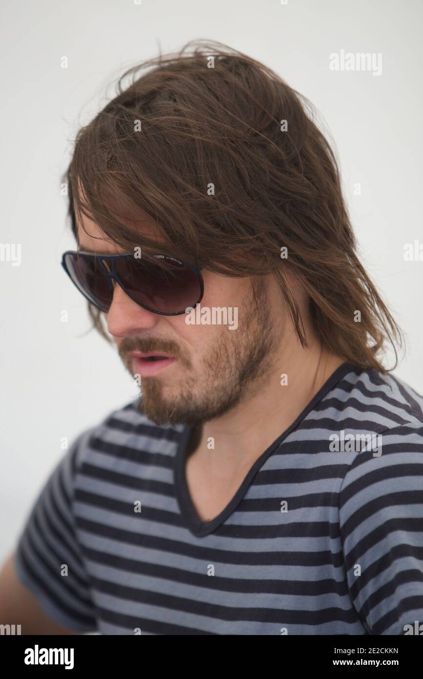 Scottish drummer Neil Primrose of Travis band, takes part in a motor ...