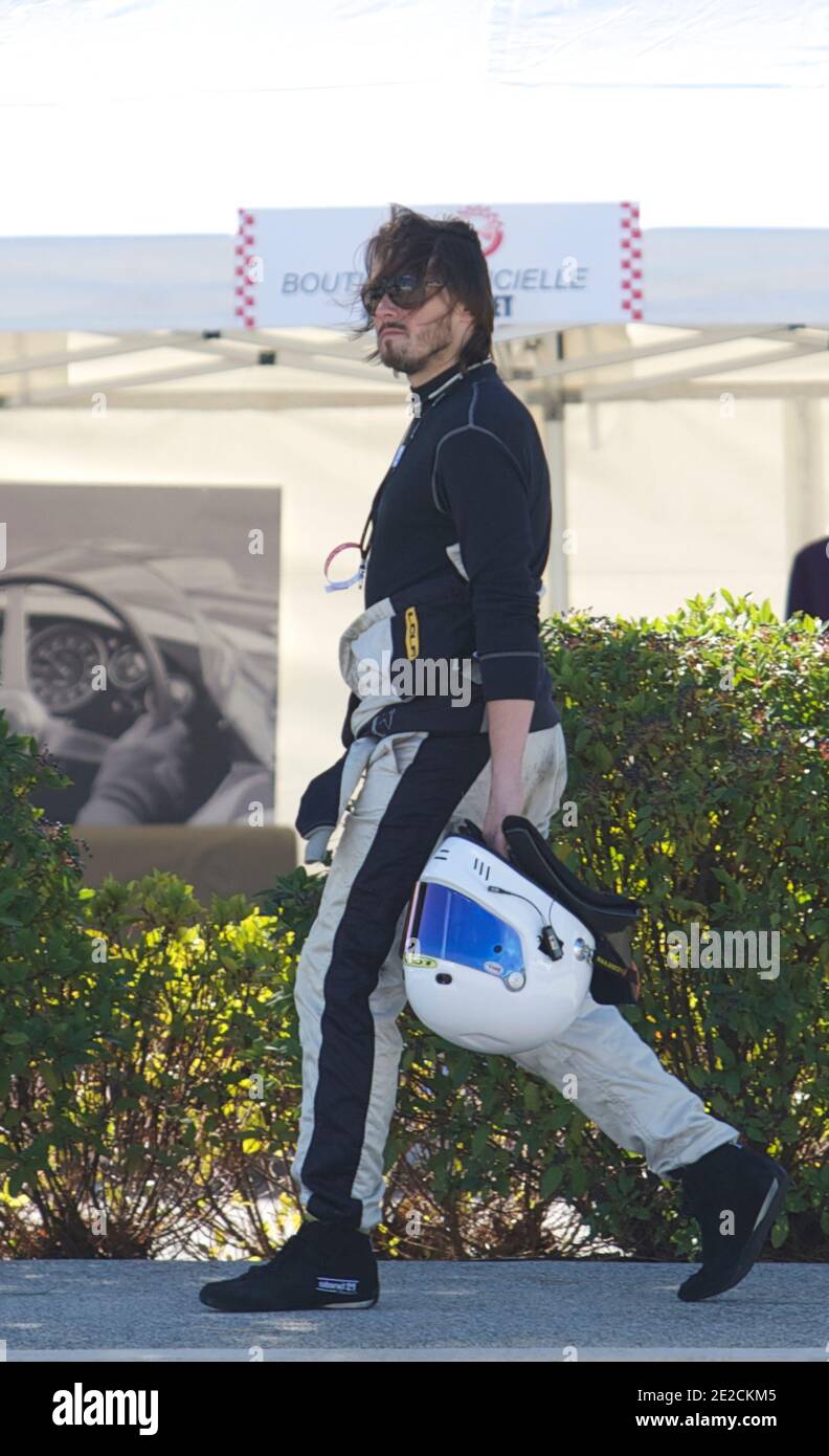 Scottish drummer Neil Primrose of Travis band, takes part in a motor ...