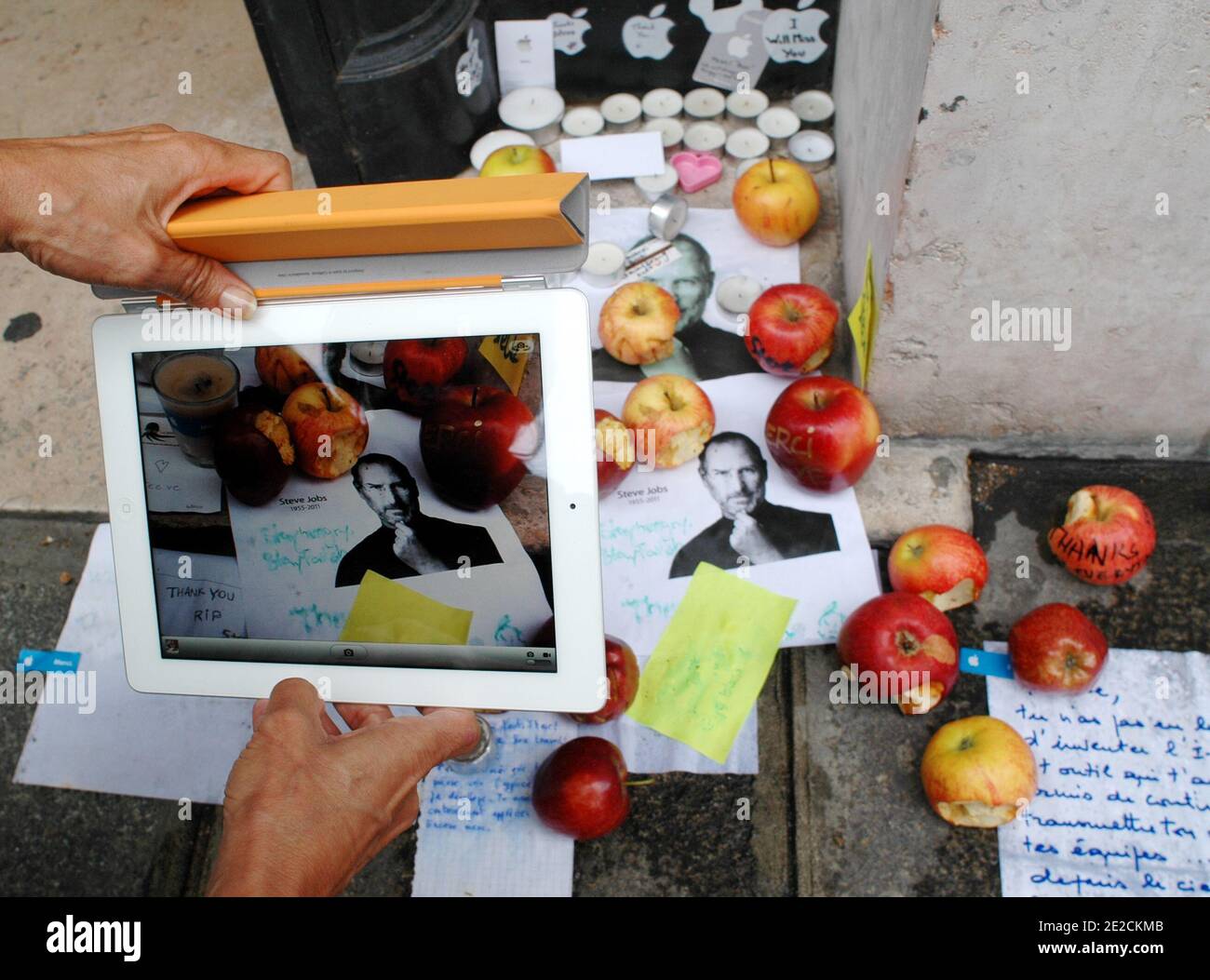 Steve Jobs tributes outside the Apple Store in Paris, France, on ...