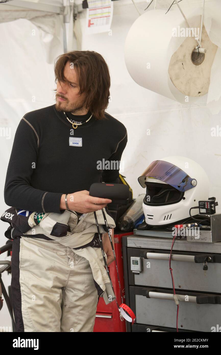 Scottish drummer Neil Primrose of Travis band, takes part in a motor ...