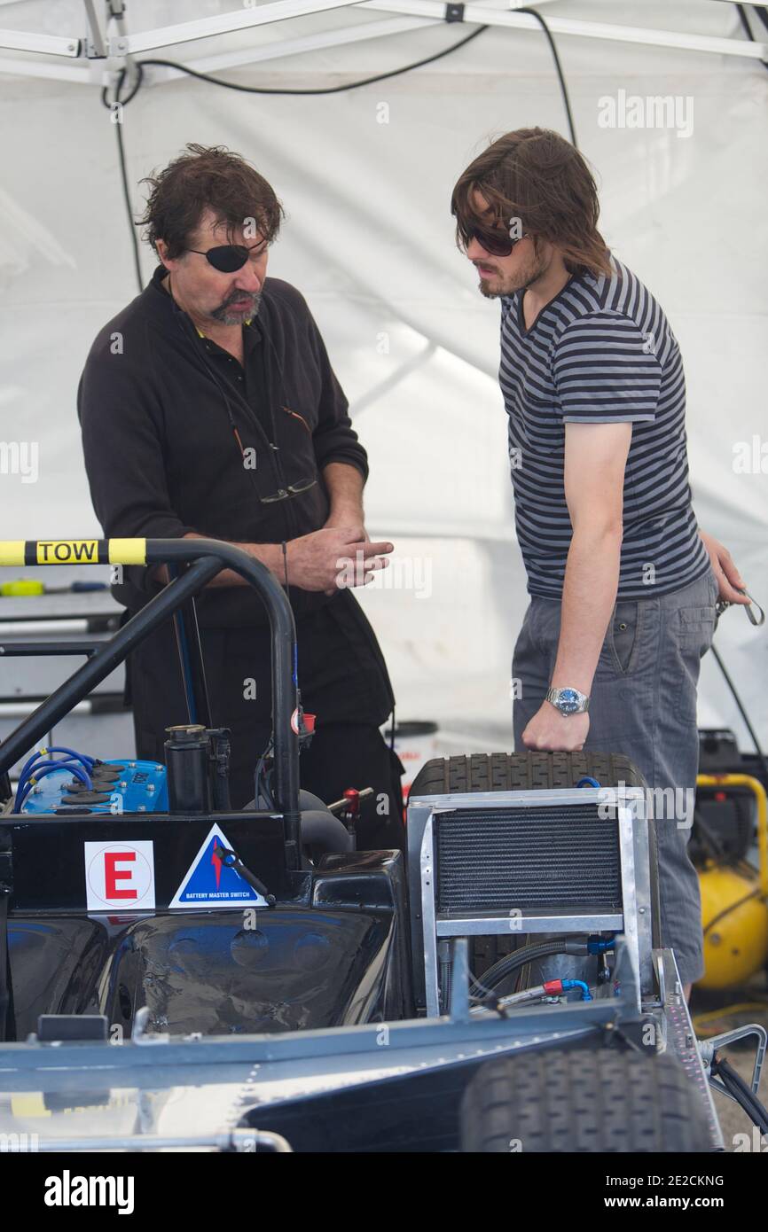 Scottish drummer Neil Primrose of Travis band, takes part in a motor ...