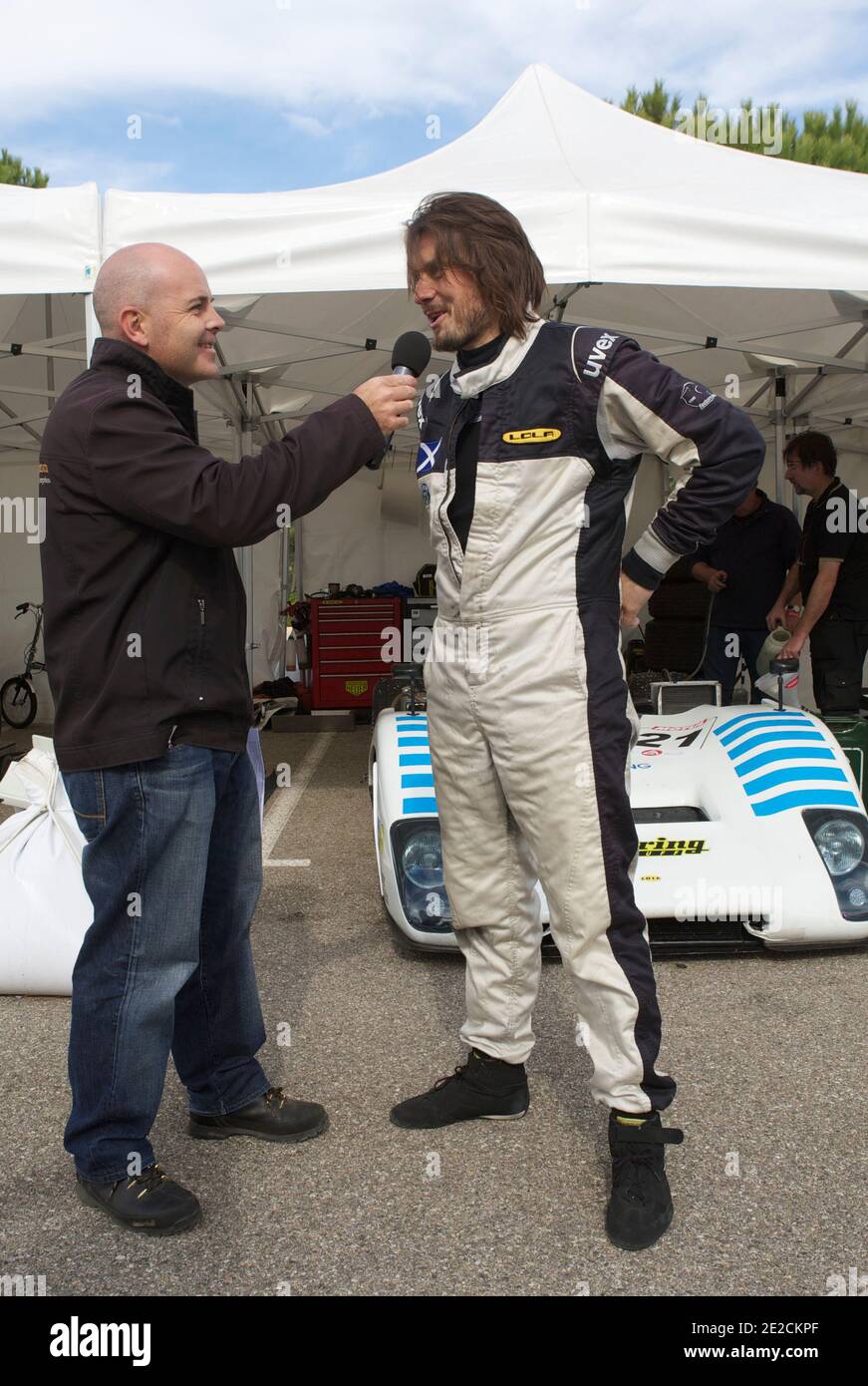 Scottish drummer Neil Primrose of Travis band, takes part in a motor ...