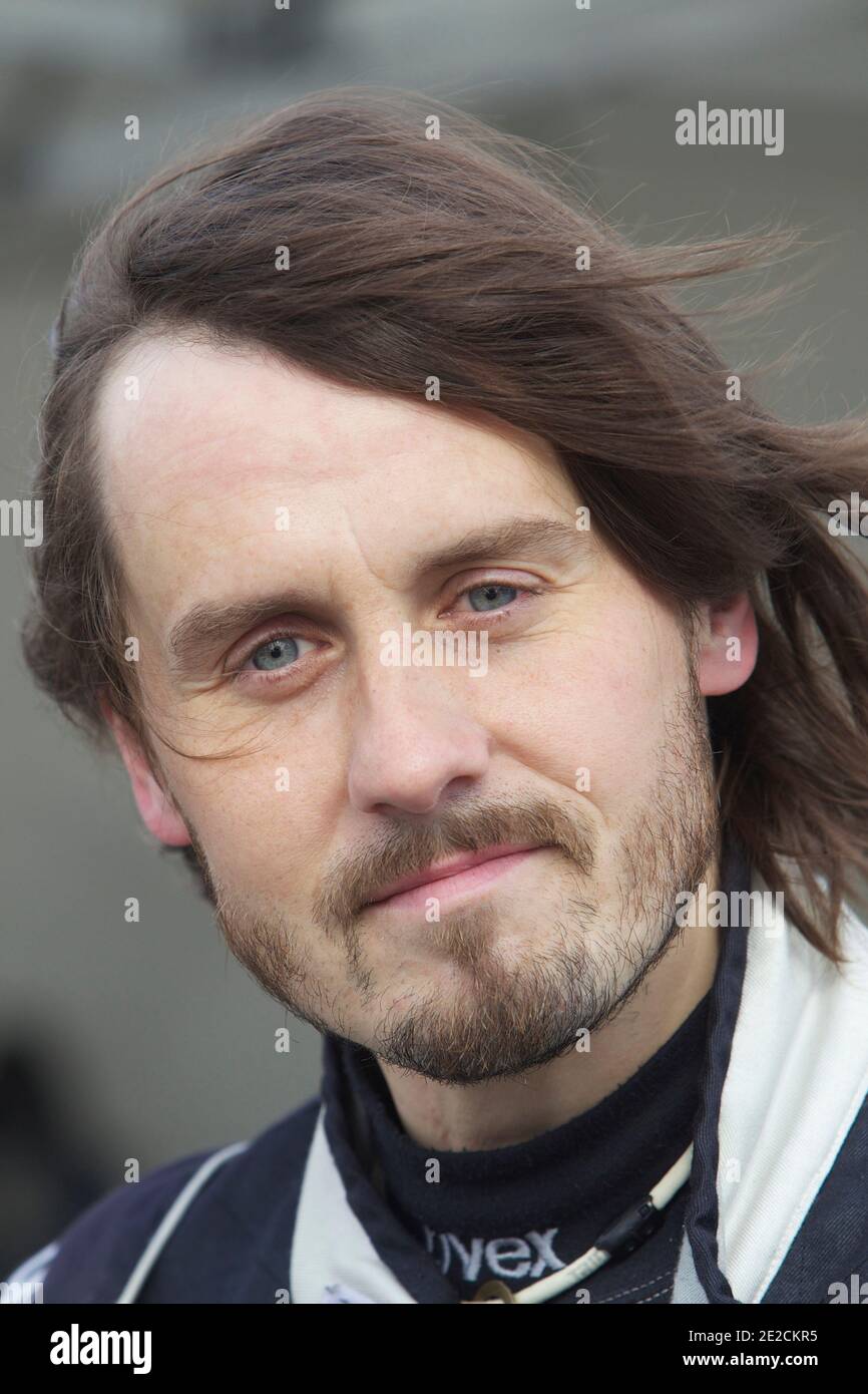 Scottish drummer Neil Primrose of Travis band, takes part in a motor ...