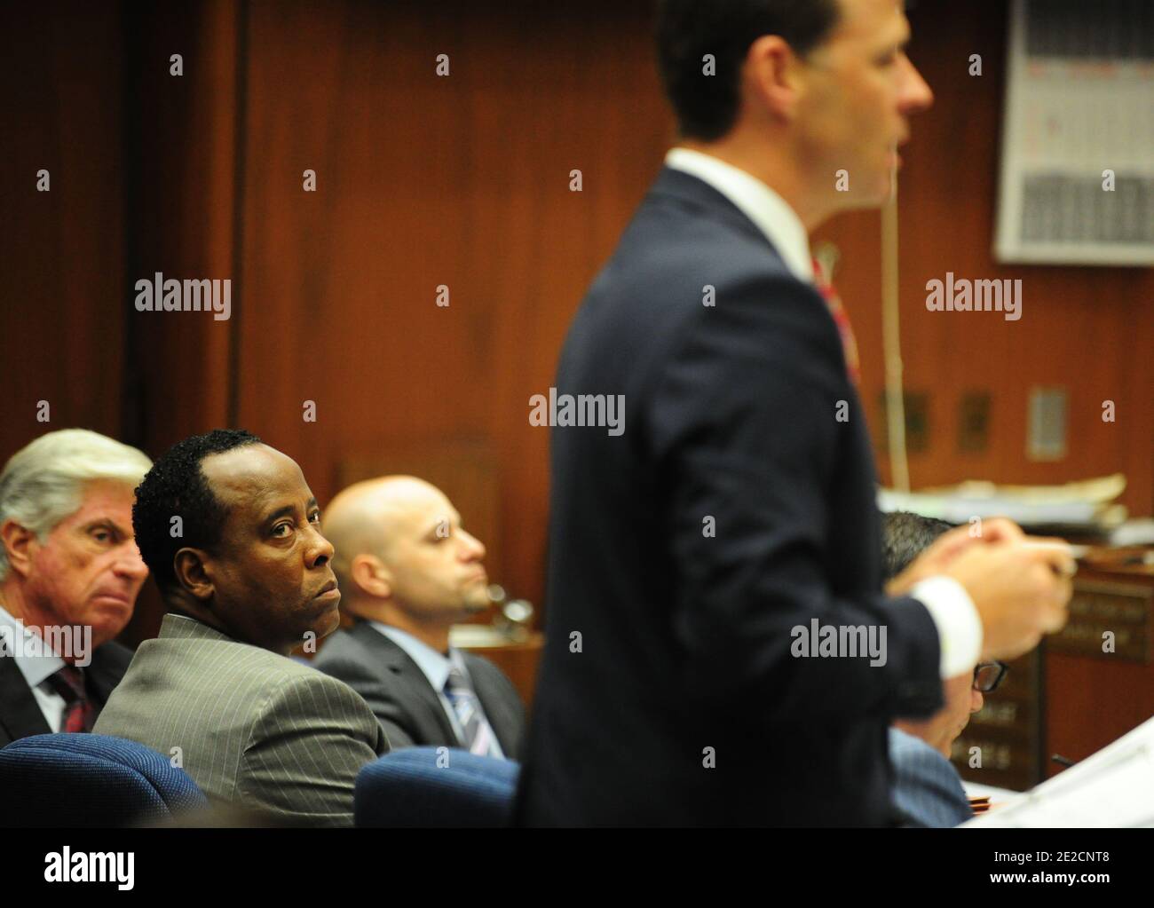 Dr. Conrad Murray, lower left, listens as deputy district attorney ...