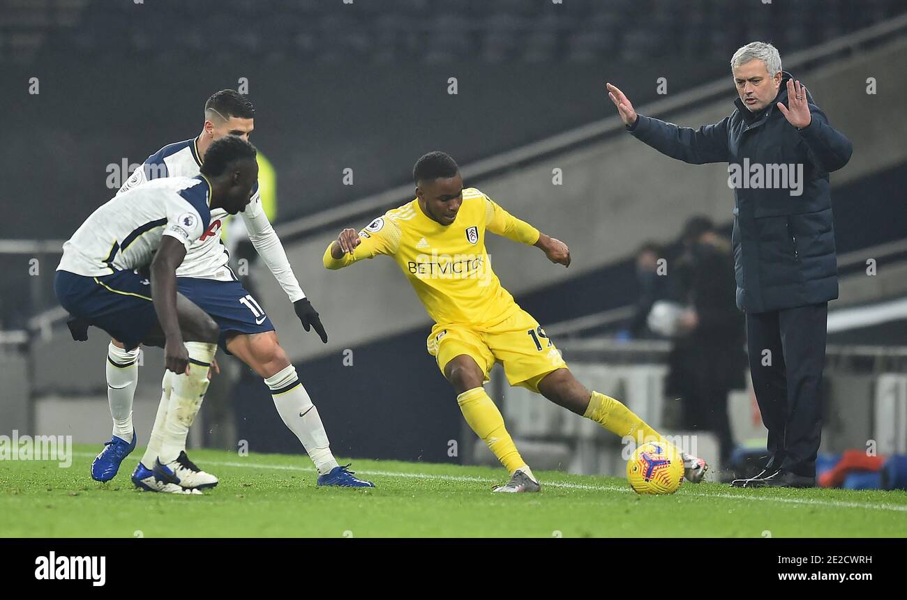 Tottenham Hotspur manager Jose Mourinho watches Fulham's Ademola ...