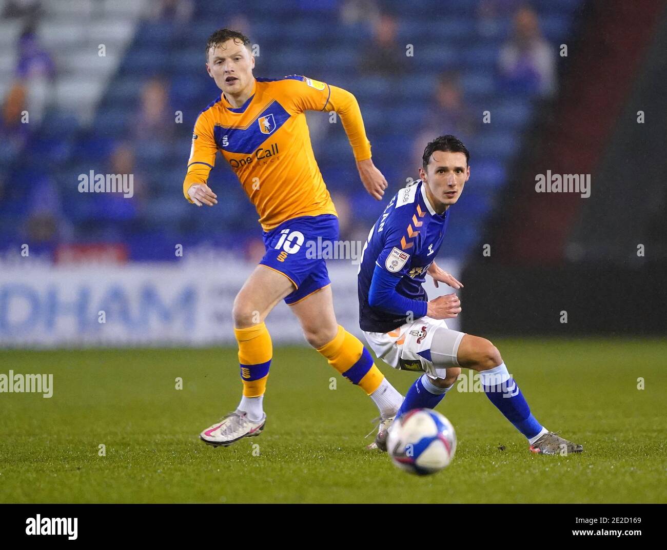 Mansfield Town's George Maris (left) and Oldham Athletic's Callum ...