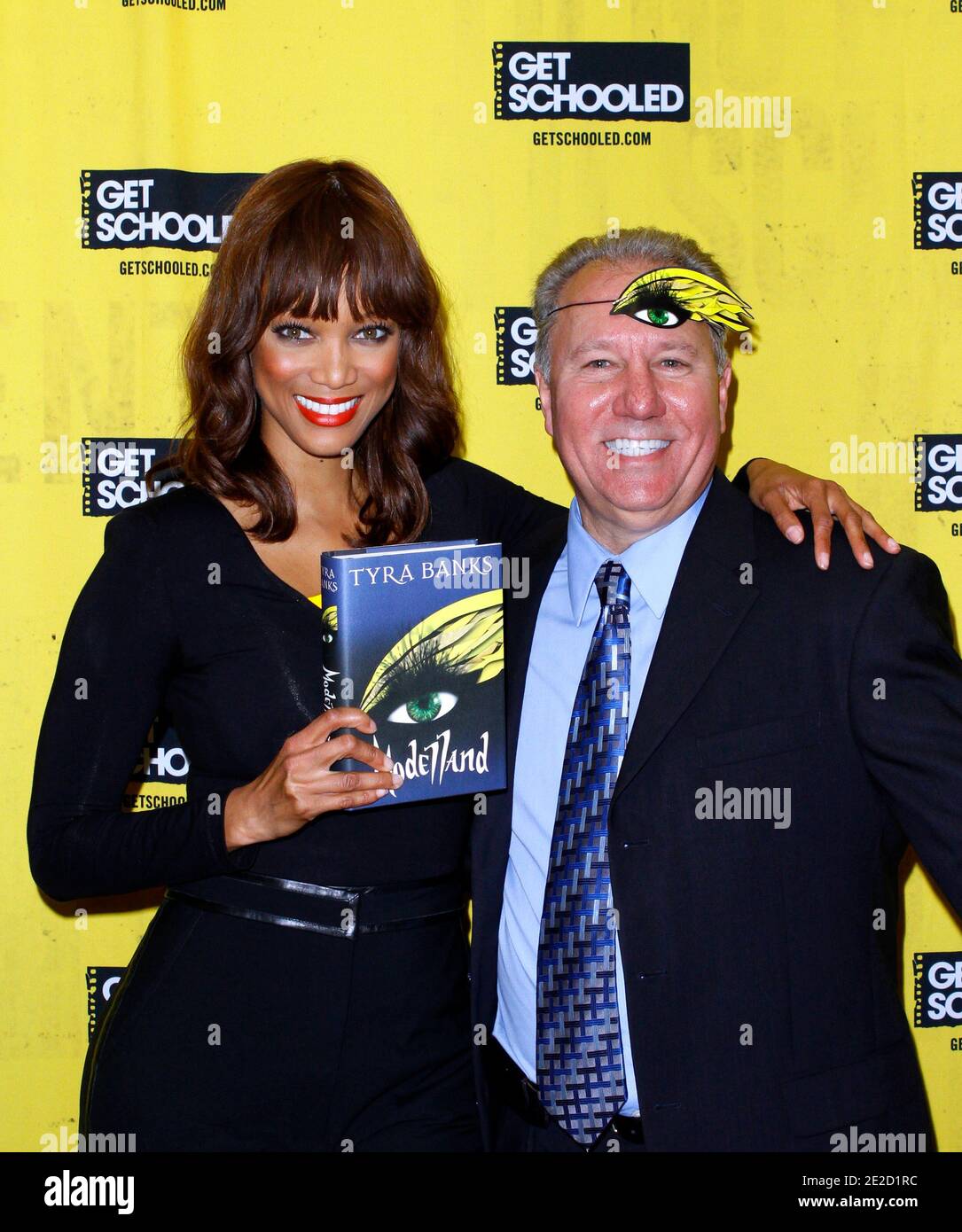 Tyra Banks and Principal Gary Prince pose at a Get Schooled Pep Rally ...