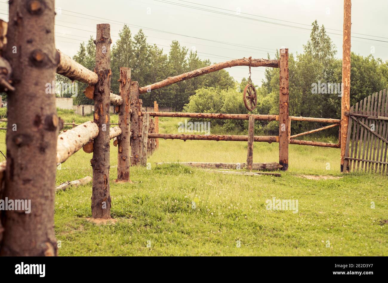 Life in the village. Wooden gate with an old deadbolt. Country fence ...