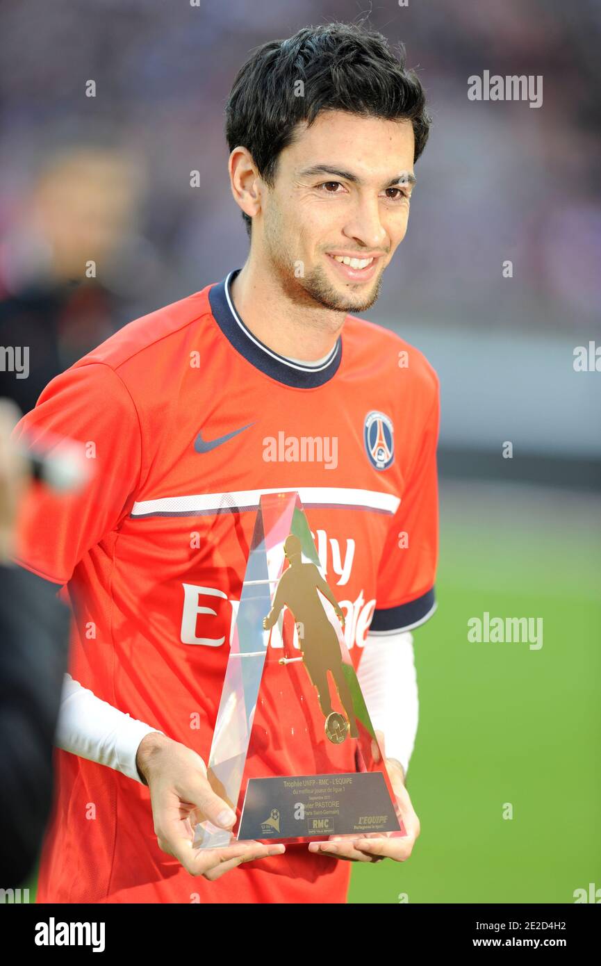 PSG's Javier Pastore receiving the prize of best player of the month ...