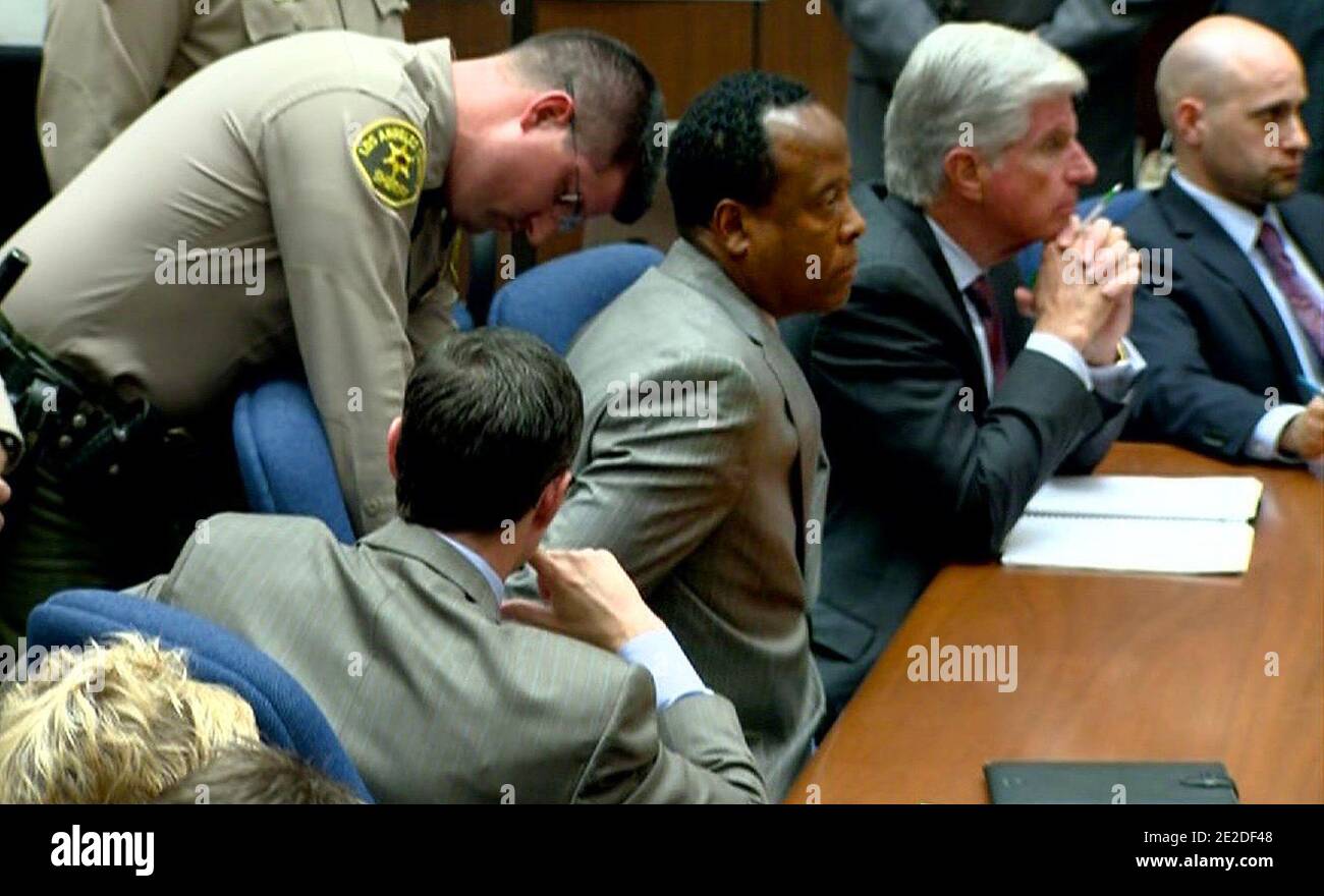 Dr. Conrad Murray is remanded into custody after the jury returned with ...
