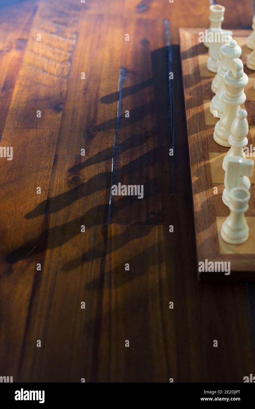 Chess pieces shadows on chess hi-res stock photography and images - Alamy