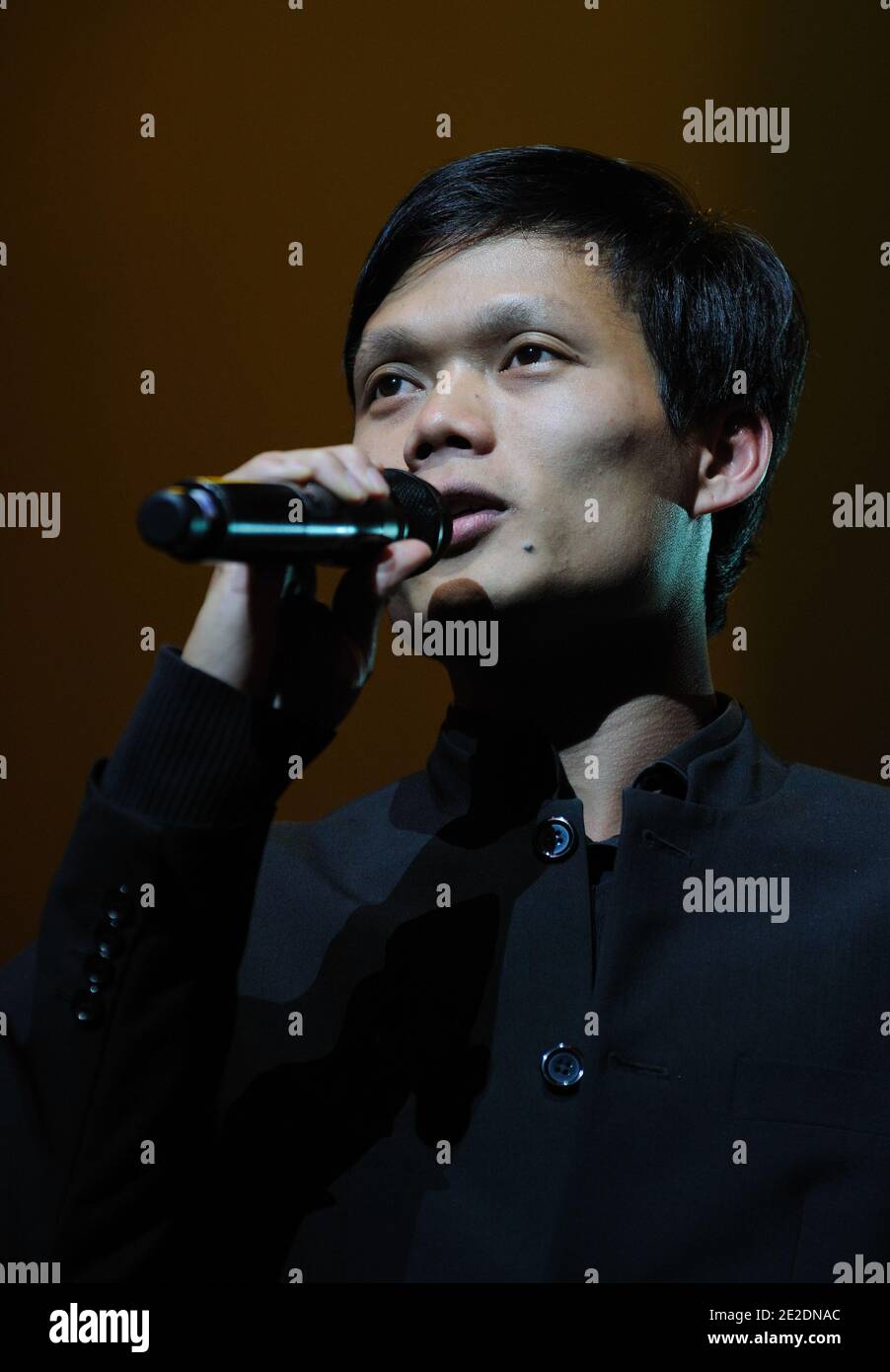 Dinh Nguyen Nguyen (Les Pretres) performing live on stage in Paris ...