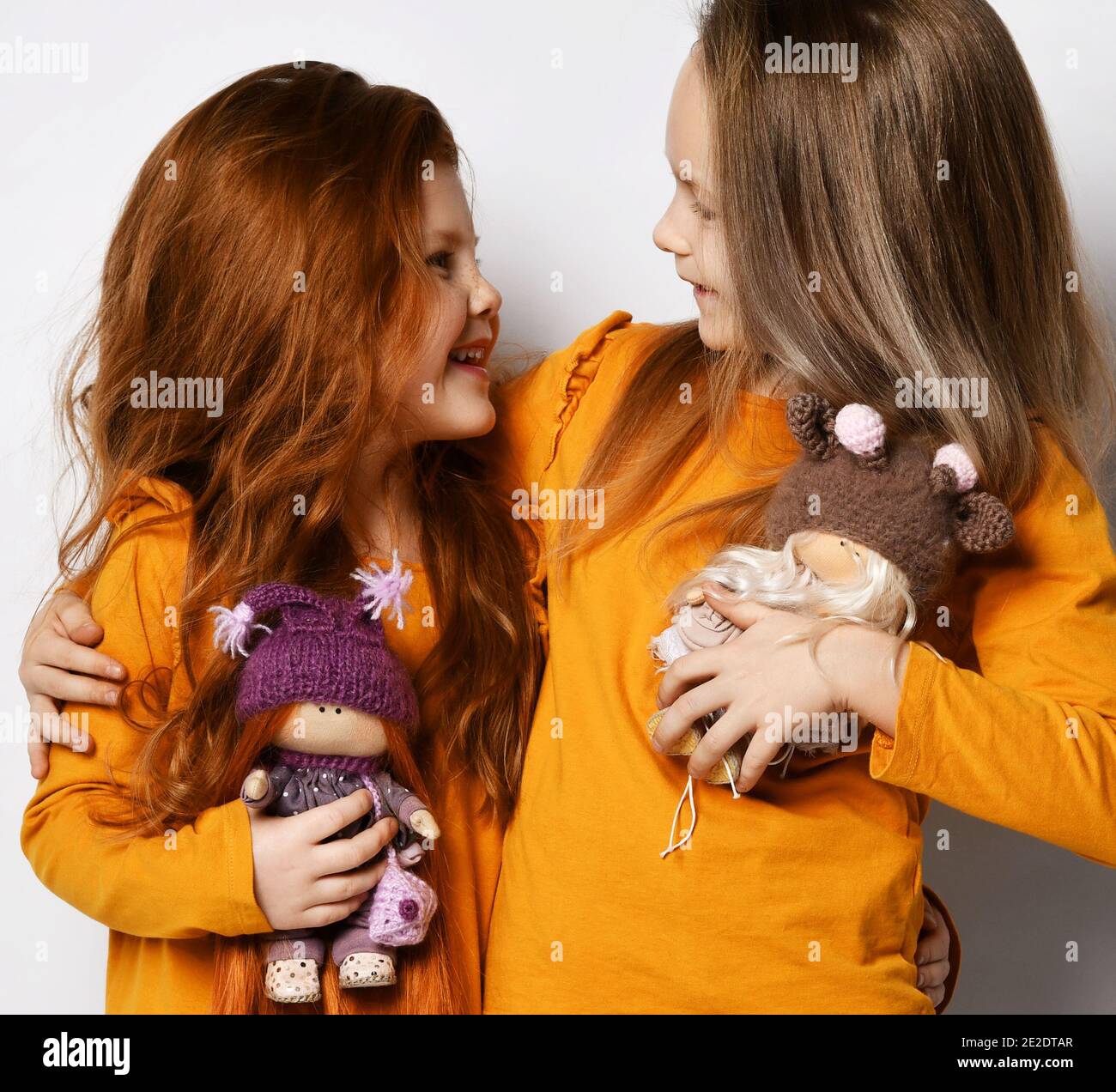 Two children hugging each other hi-res stock photography and images - Alamy