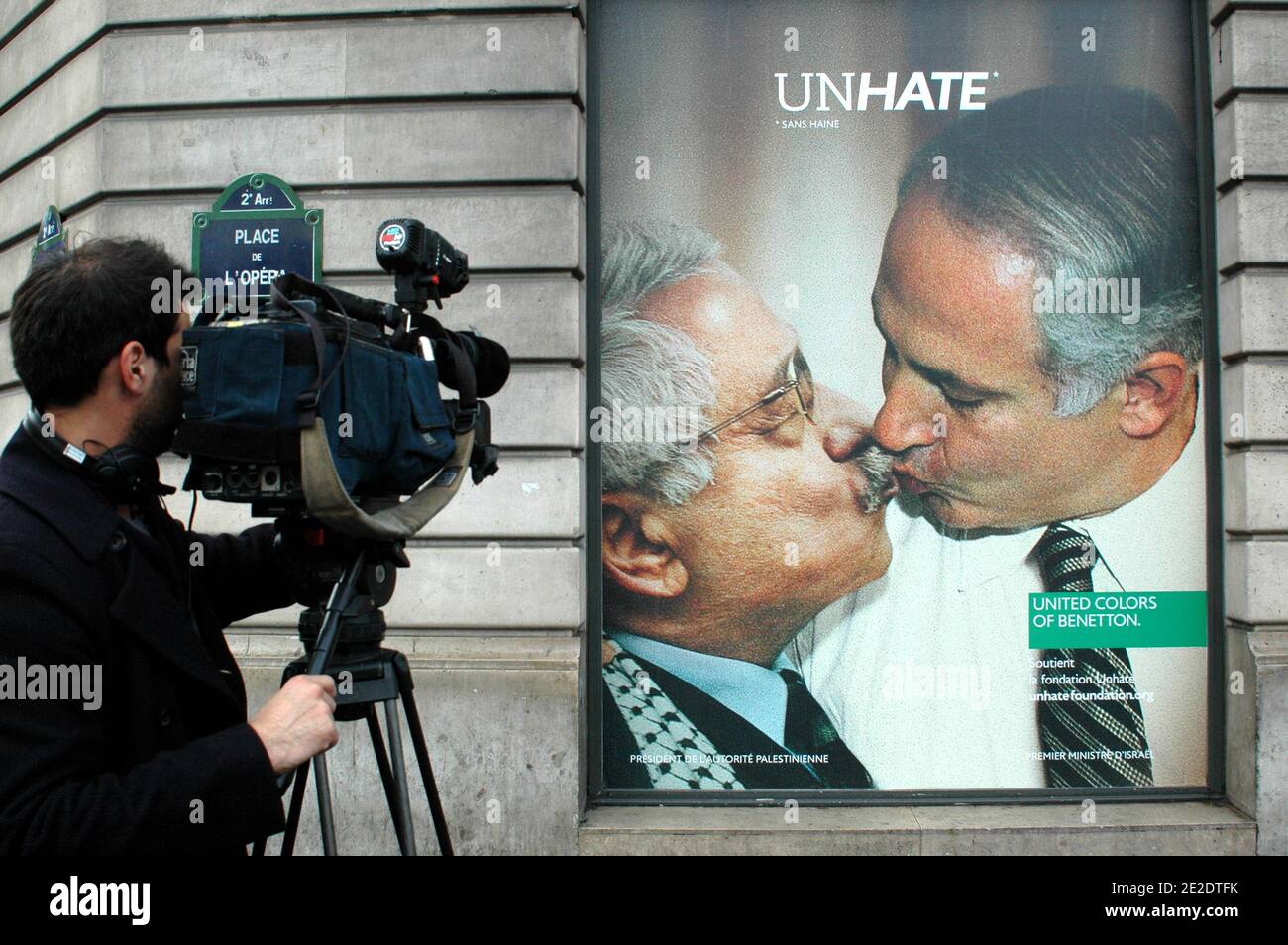 Posters from new Benetton's ad campaign 'Unhate' are on display on it's ...