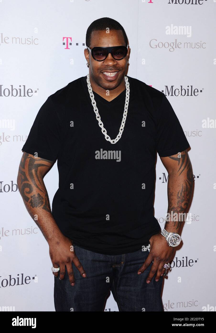 Busta Rhymes arrives for the launch of Google Music at Mr. Brainwash ...
