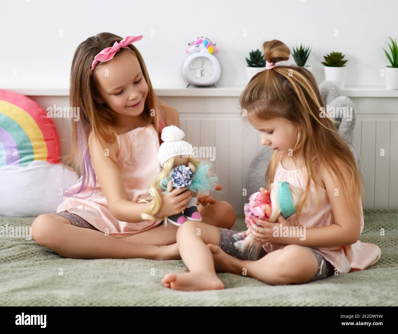 Girl play dolls hi-res stock photography and images - Alamy
