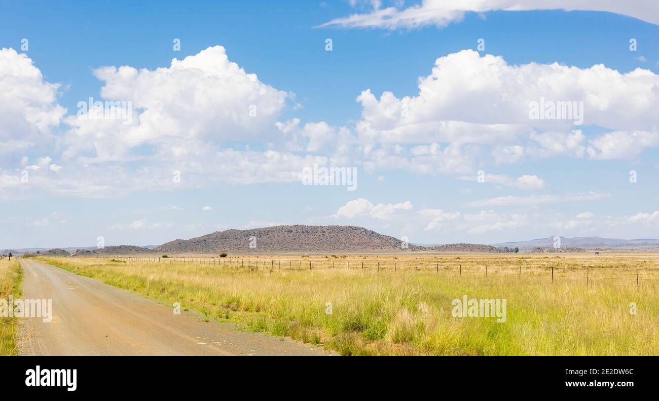 Dry grass rural field under the clear blue sky Stock Photo - Alamy