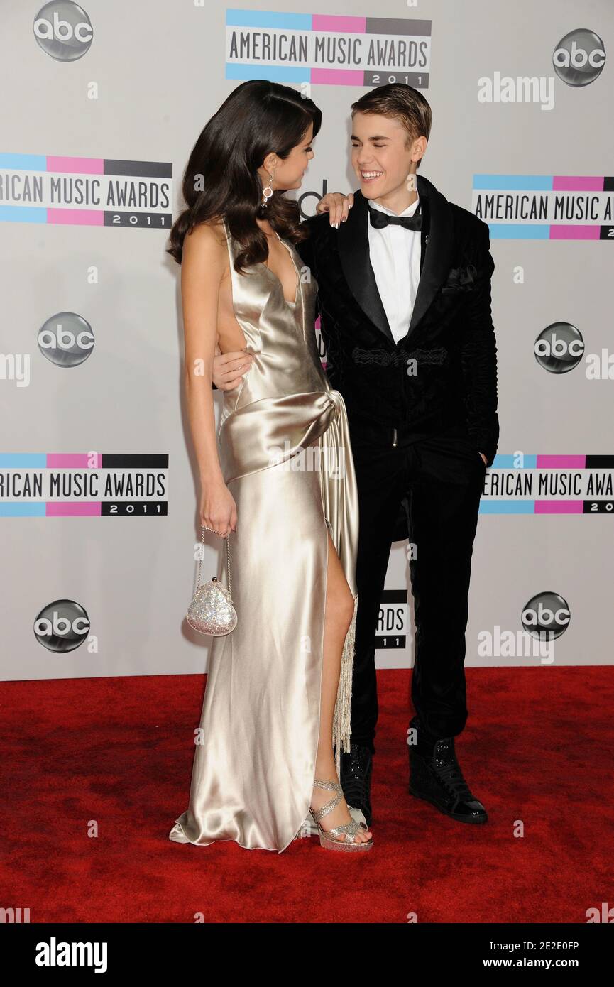 Justin Bieber, Selena Gomez arriving for the 2011 American Music Awards ...