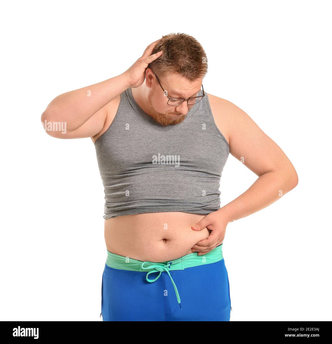 Confused overweight man on white background. Weight loss concept Stock ...
