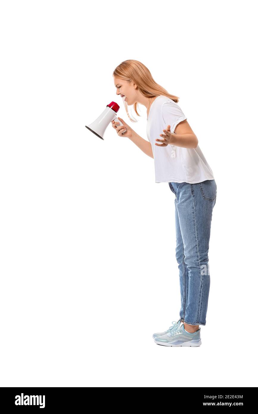 Beautiful young woman shouting into megaphone on white background Stock ...