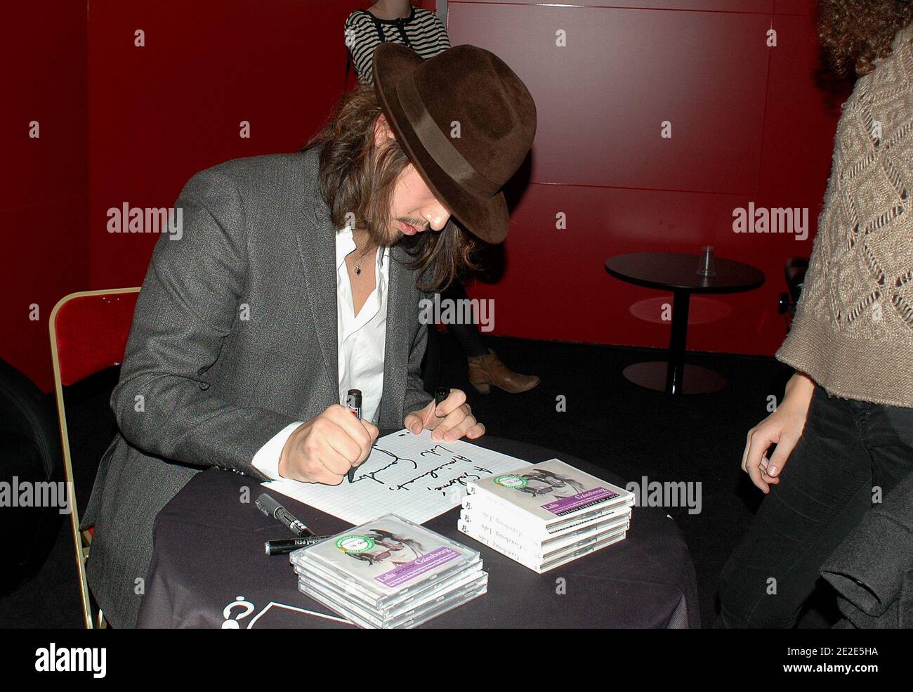 Lulu Gainsbourg performs lives and signs copies of his album titled ...