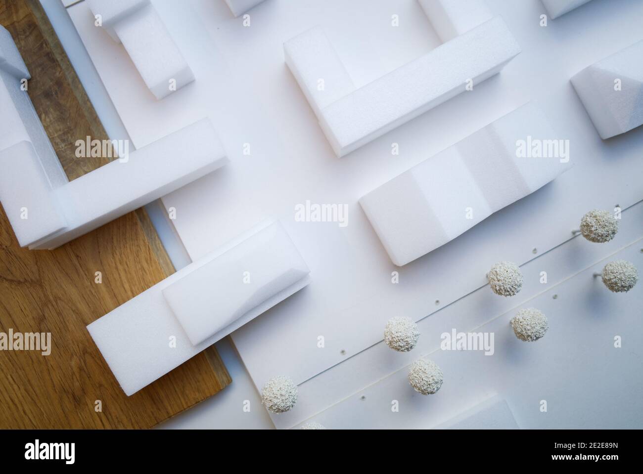Top view of white architectural models. Architect's design thinking ...